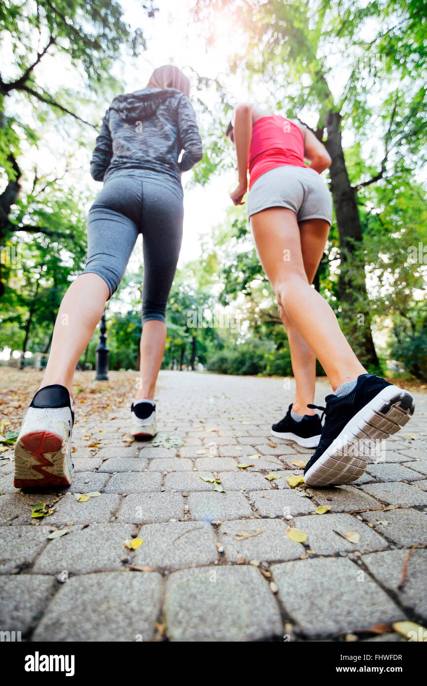 Women jogging in park and living a healthy sporty life Stock Photo - Alamy