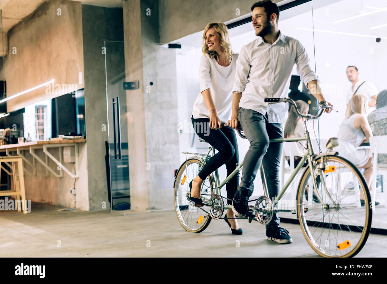 Business in motion, partnership represented by twin bicycle Stock Photo ...