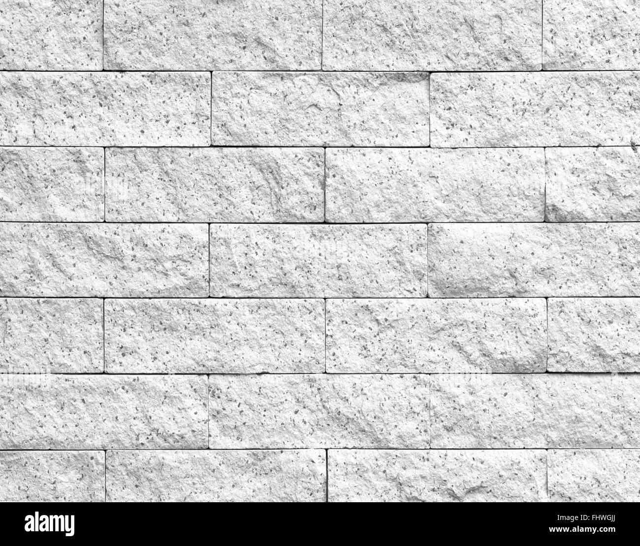 Elegant stone wall from small square parts Stock Photo - Alamy