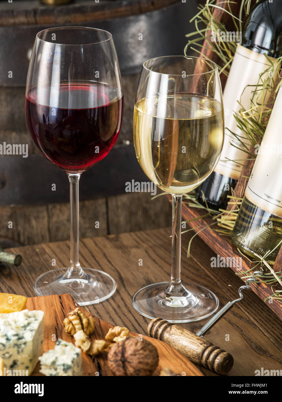Wine bottles on the wooden shelf Stock Photo - Alamy