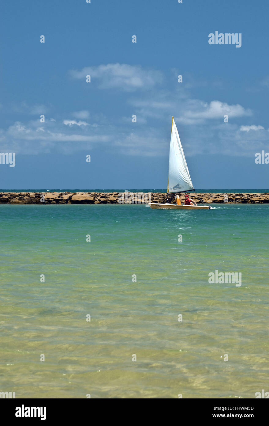 Sailboat in natural pool formed by reef in Muro Alto Beach - Porto de ...