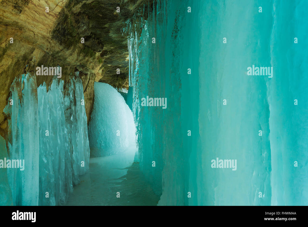 Backlit translucent ice in The Curtains ice formation in Pictured Rocks ...