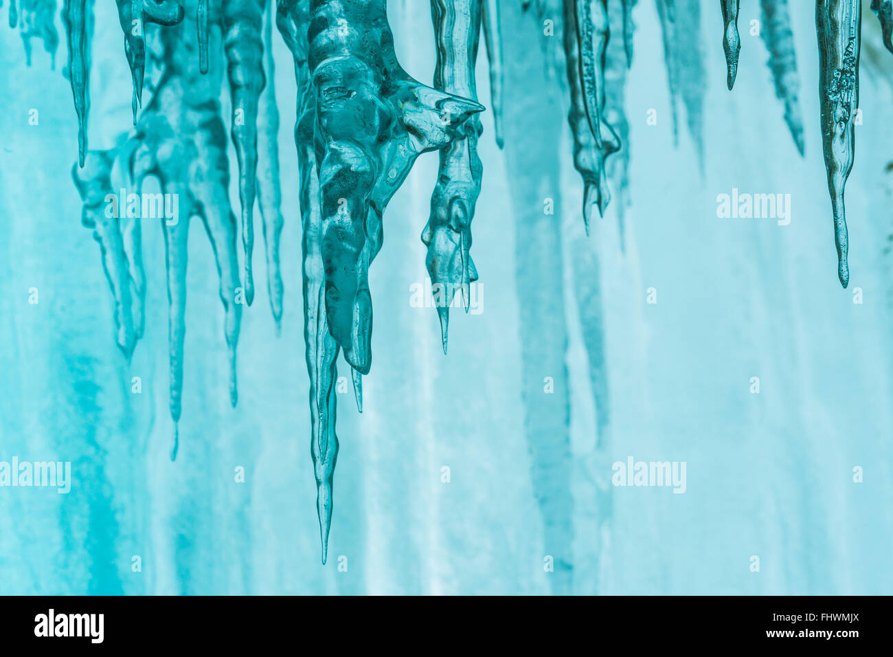Backlit translucent ice in The Curtains ice formation in Pictured Rocks ...