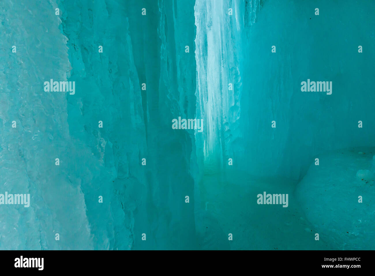 Backlit translucent ice in The Curtains ice formation in Pictured Rocks ...