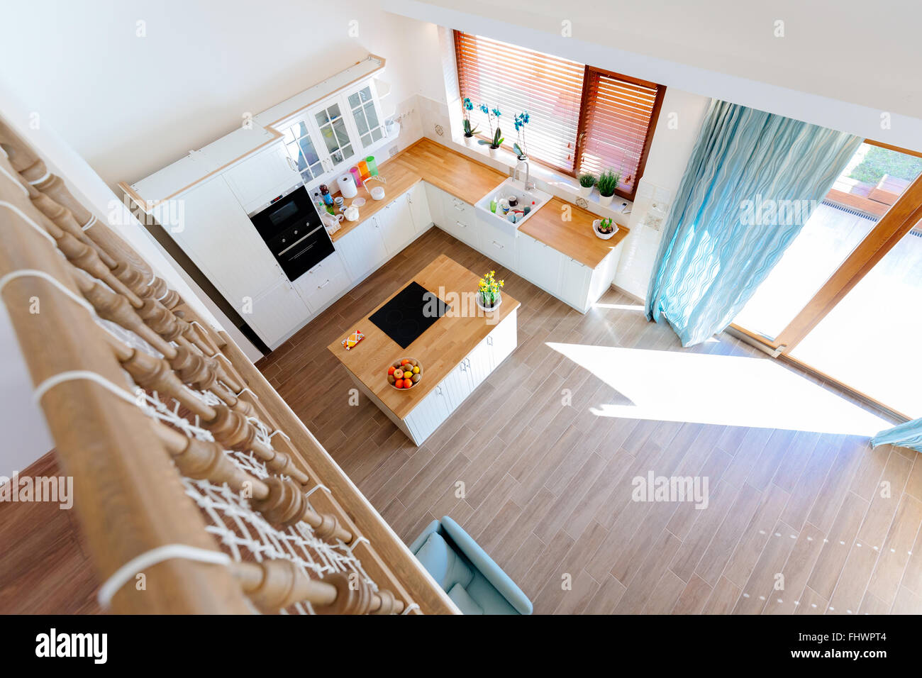 Modern equipped kitchen top view Stock Photo - Alamy
