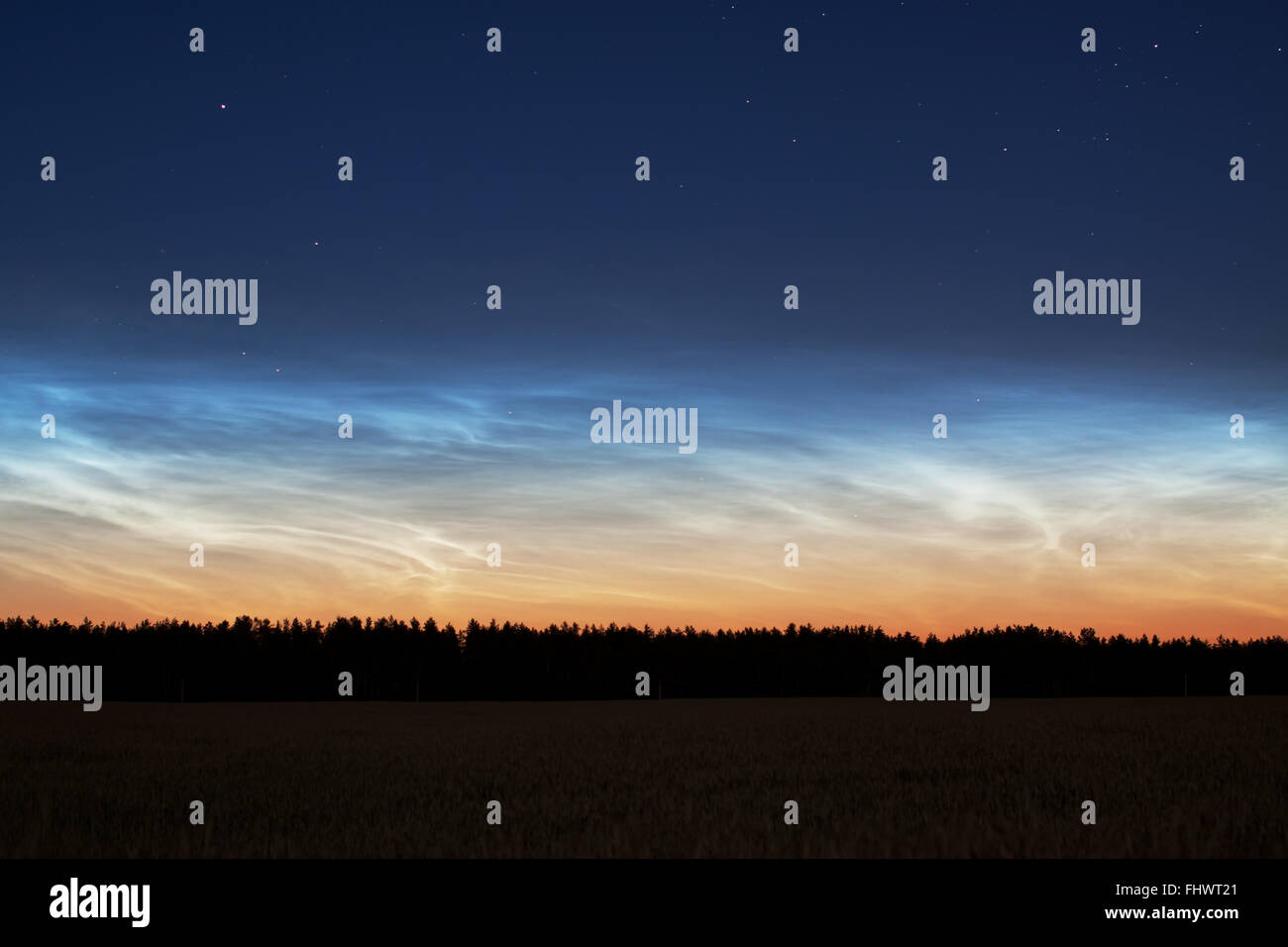 Rare sky phenomenon noctilucent clouds night rural landscape photograph ...