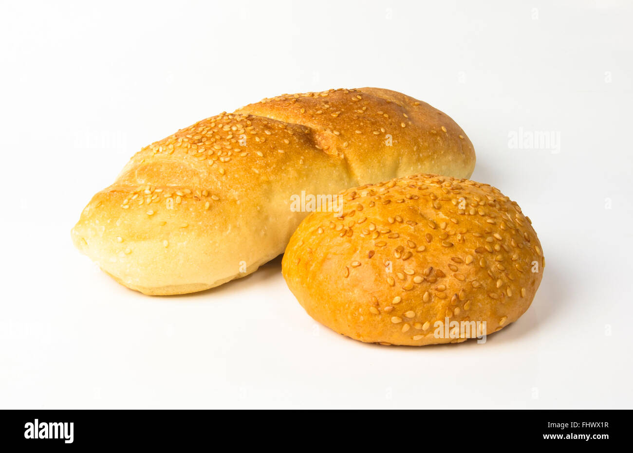 whole wheat breads and bun on white background Stock Photo - Alamy