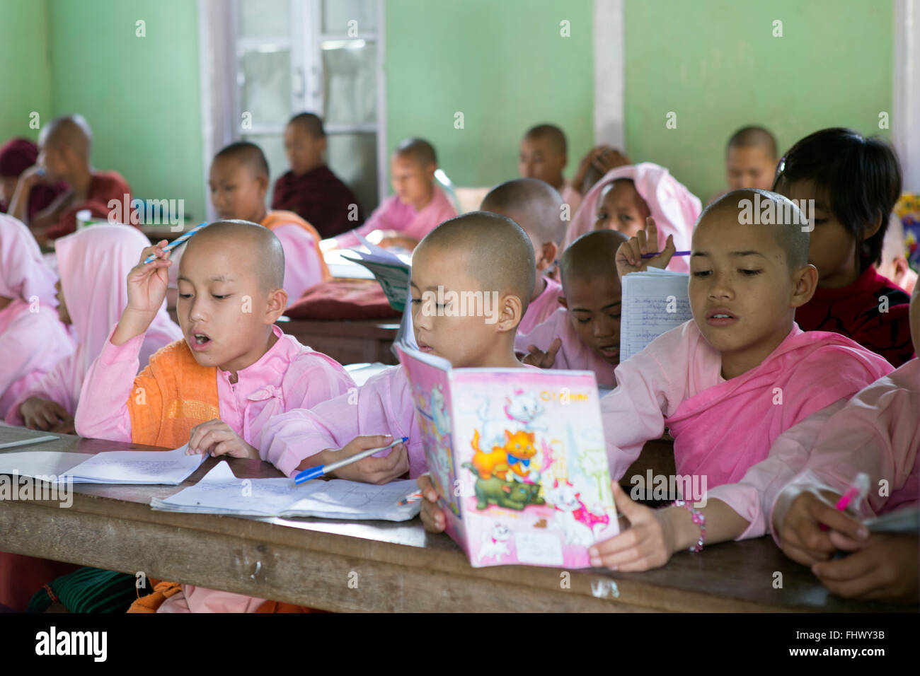 Buddhist nuns at school in their classroom Stock Photo - Alamy