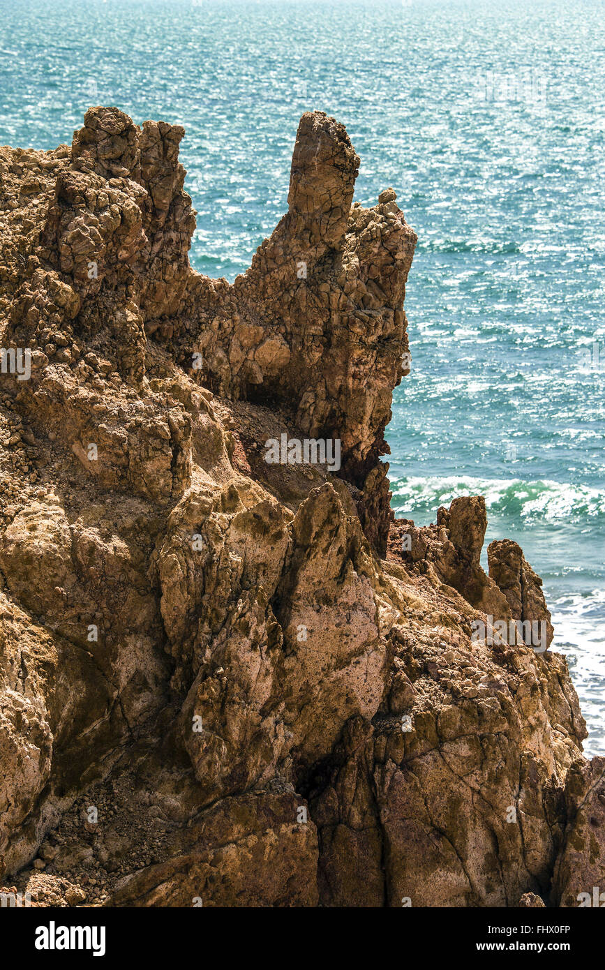 Cliff in Round Beach Stock Photo - Alamy