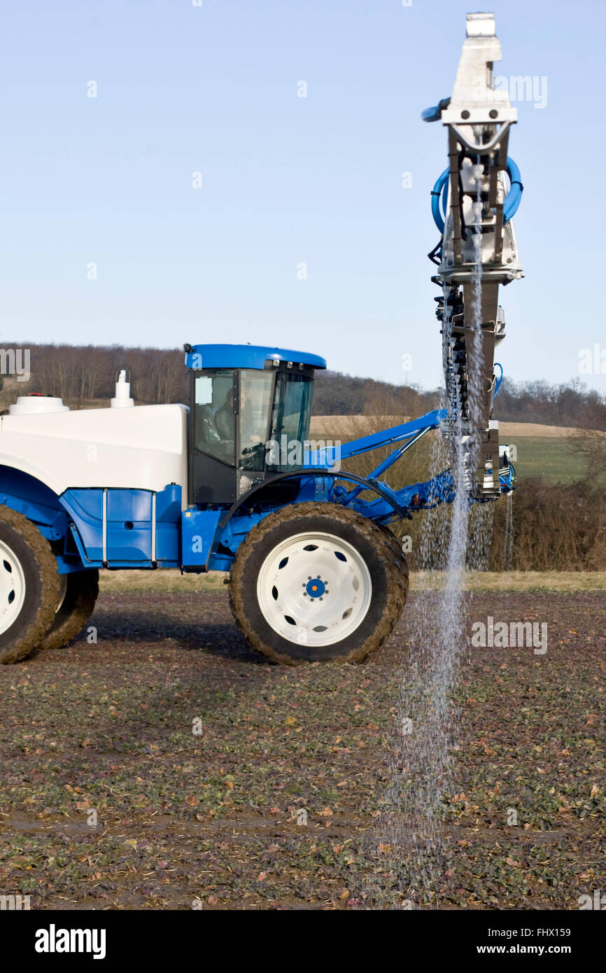 Spraying farm field with liquid manure hi-res stock photography and ...