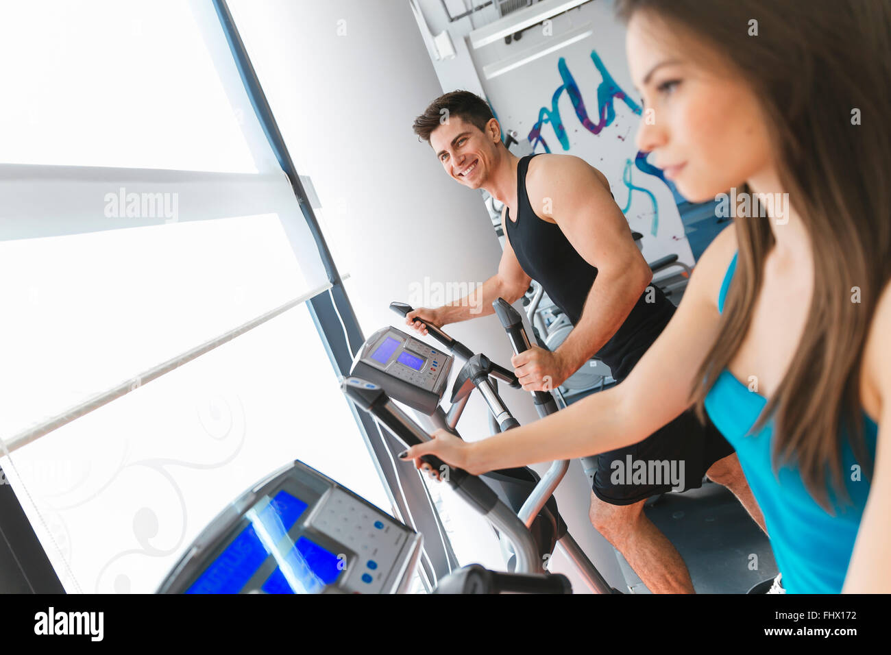 People exercising in gym to keep body in shape Stock Photo - Alamy