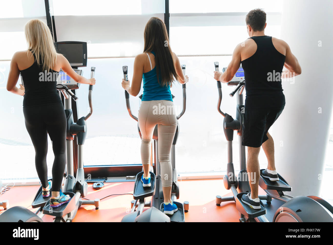 People exercising in gym to keep body in shape Stock Photo - Alamy