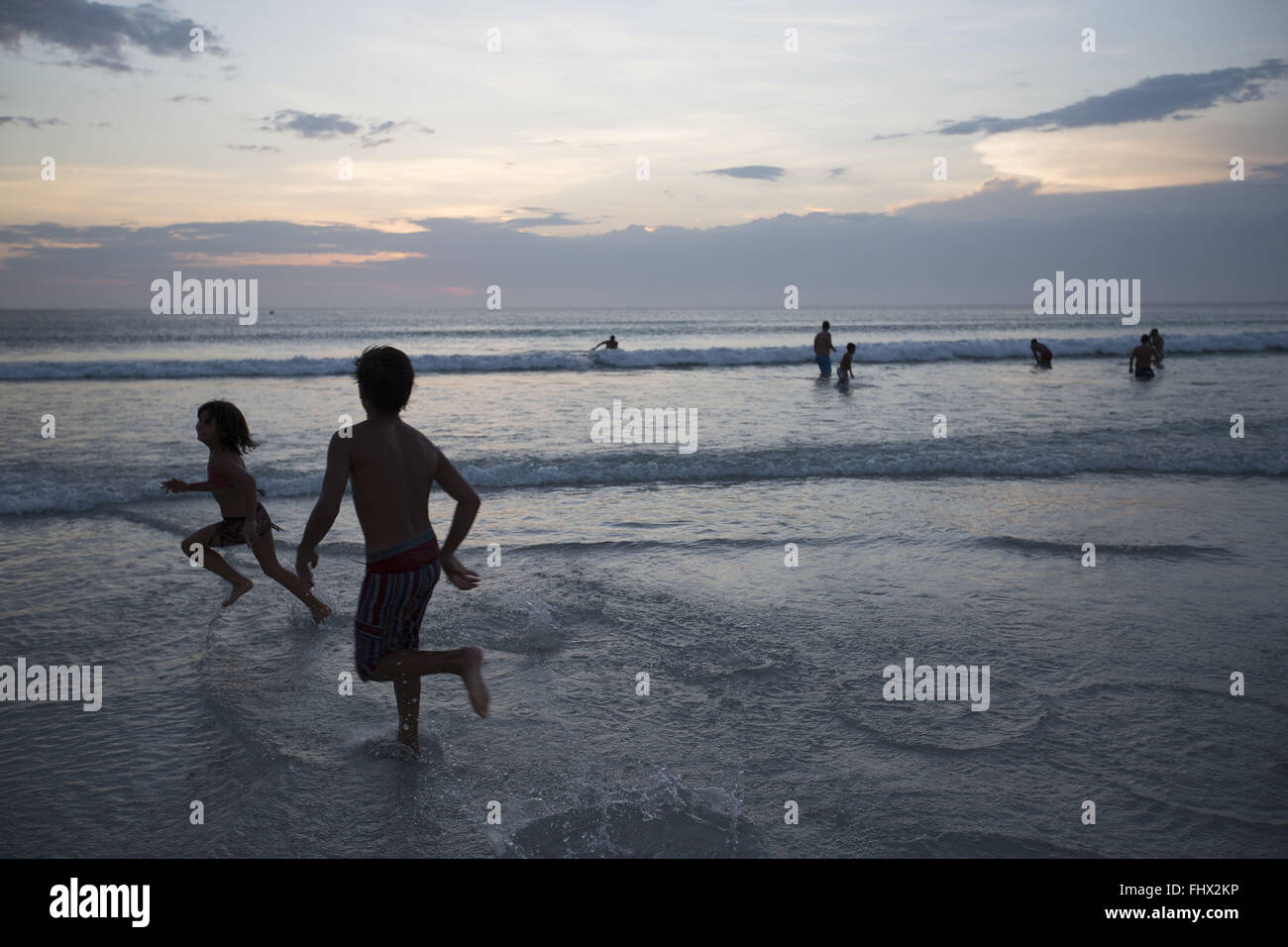 Bathers on the Beach Great for sunset Stock Photo - Alamy