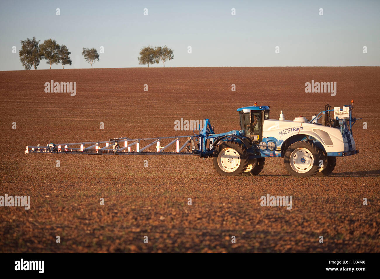 Manure spreading in a field Stock Photo - Alamy