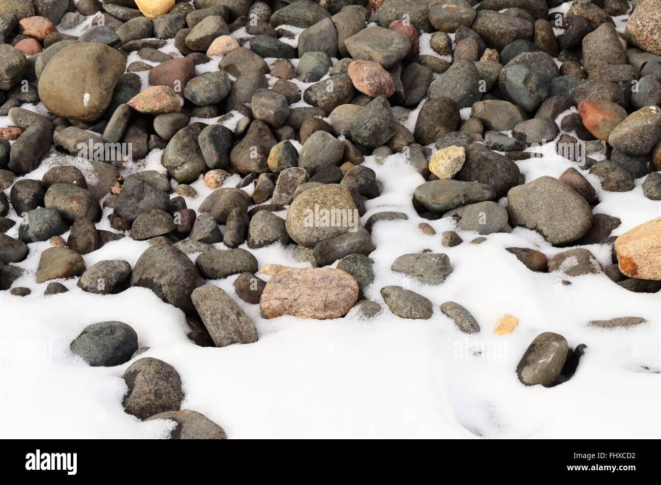 Rocks and snow background Stock Photo - Alamy