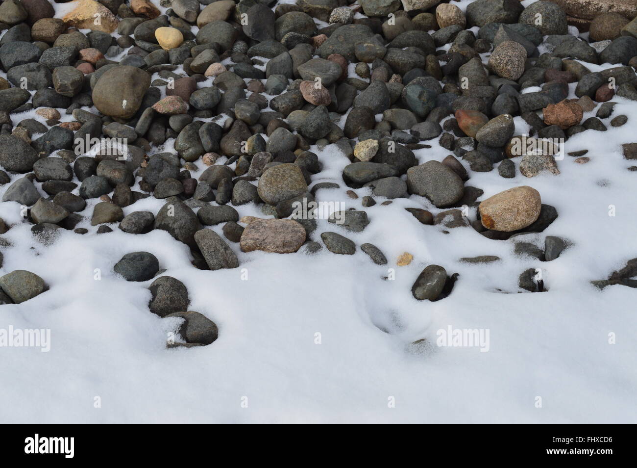 Rocks and snow background Stock Photo - Alamy