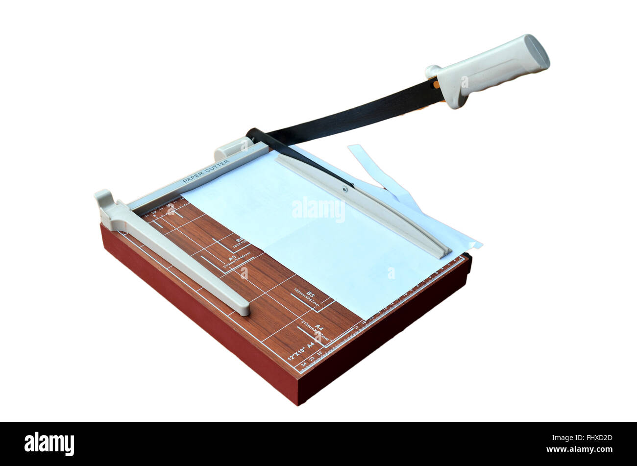 Paper Cutter cutting paper A4 Stock Photo - Alamy