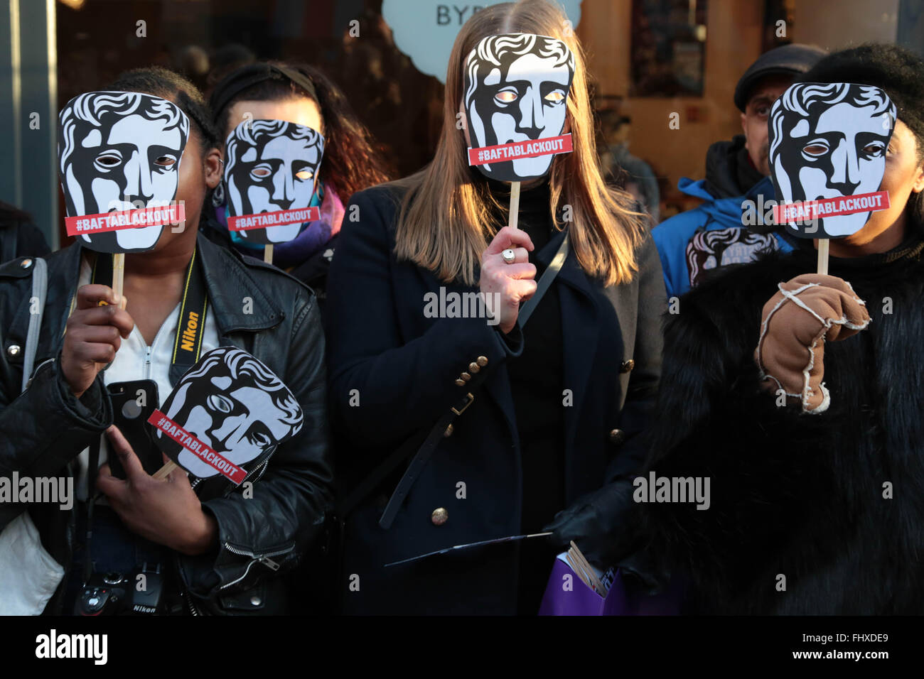 Demonstrators with placards outside the Royal Opera house in protest at ...