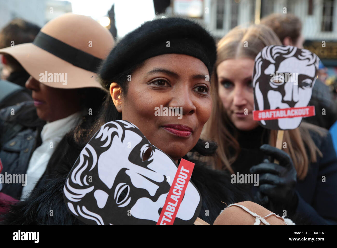 Demonstrators with placards outside the Royal Opera house in protest at ...