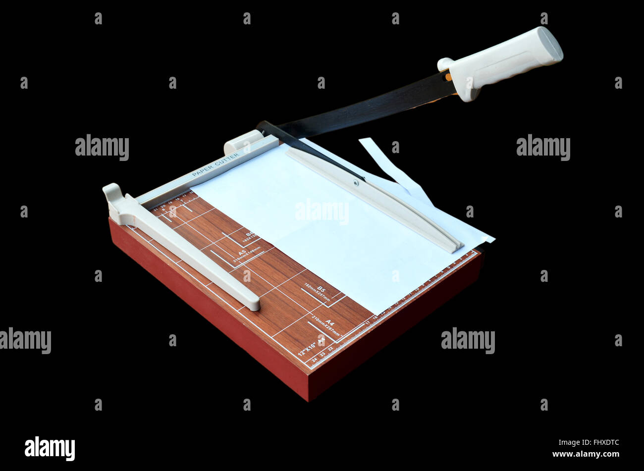 Paper Cutter cutting paper A4 Stock Photo - Alamy