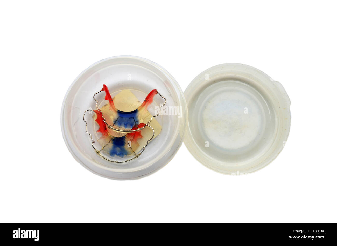 Retainer fashion in white plastic box Stock Photo - Alamy