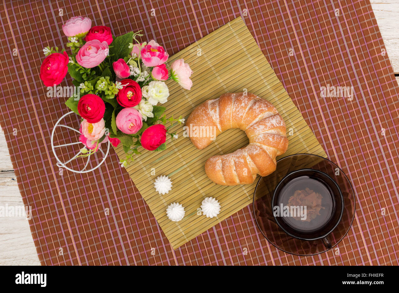 croissant, and green tea flowers, a top view Stock Photo - Alamy