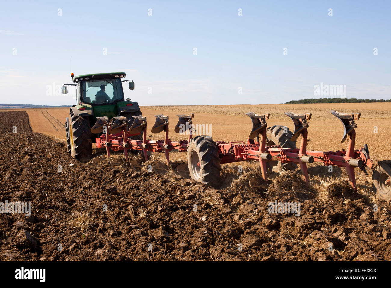 Ploughing by tractor hi-res stock photography and images - Alamy