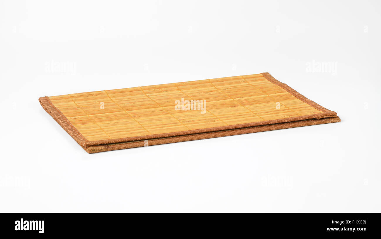 Bamboo place mat with brown border Stock Photo - Alamy