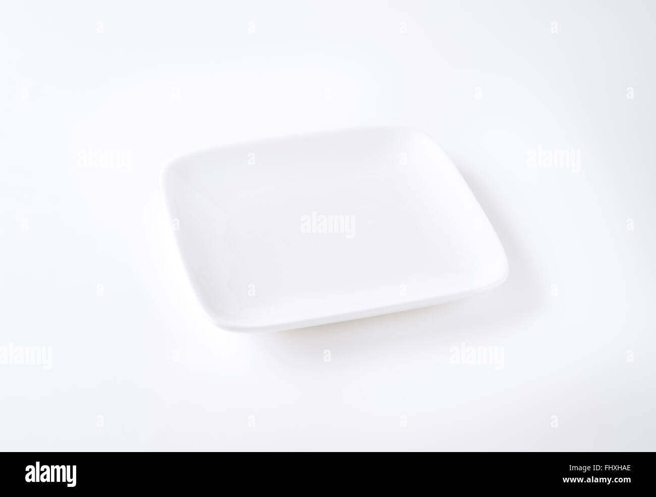 white square plate on white background Stock Photo - Alamy