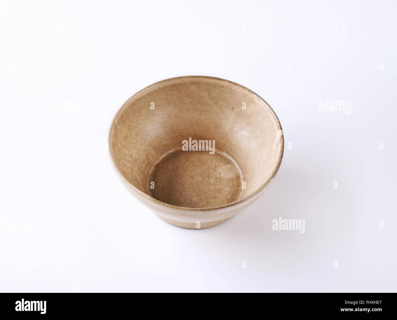 empty brown bowl on white background Stock Photo - Alamy