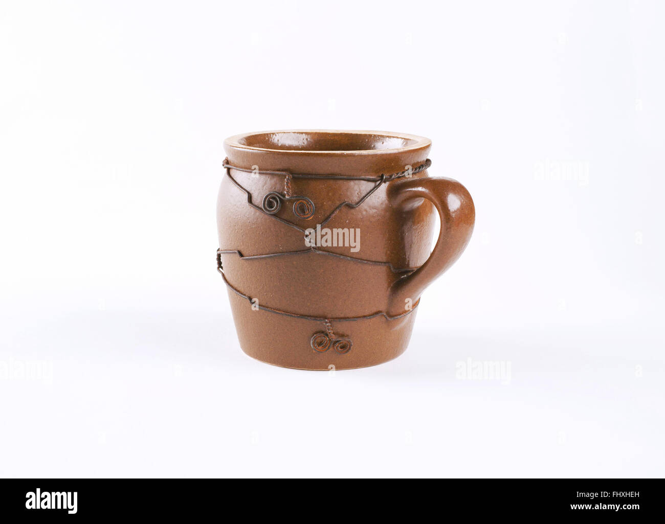 empty handcrafted mug on white background Stock Photo - Alamy