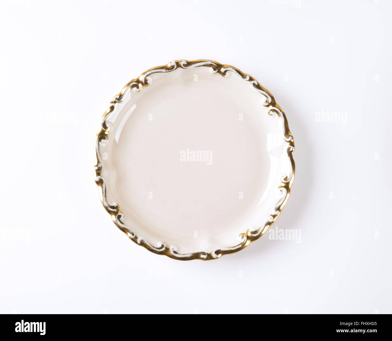 empty decorative plate on white background Stock Photo - Alamy