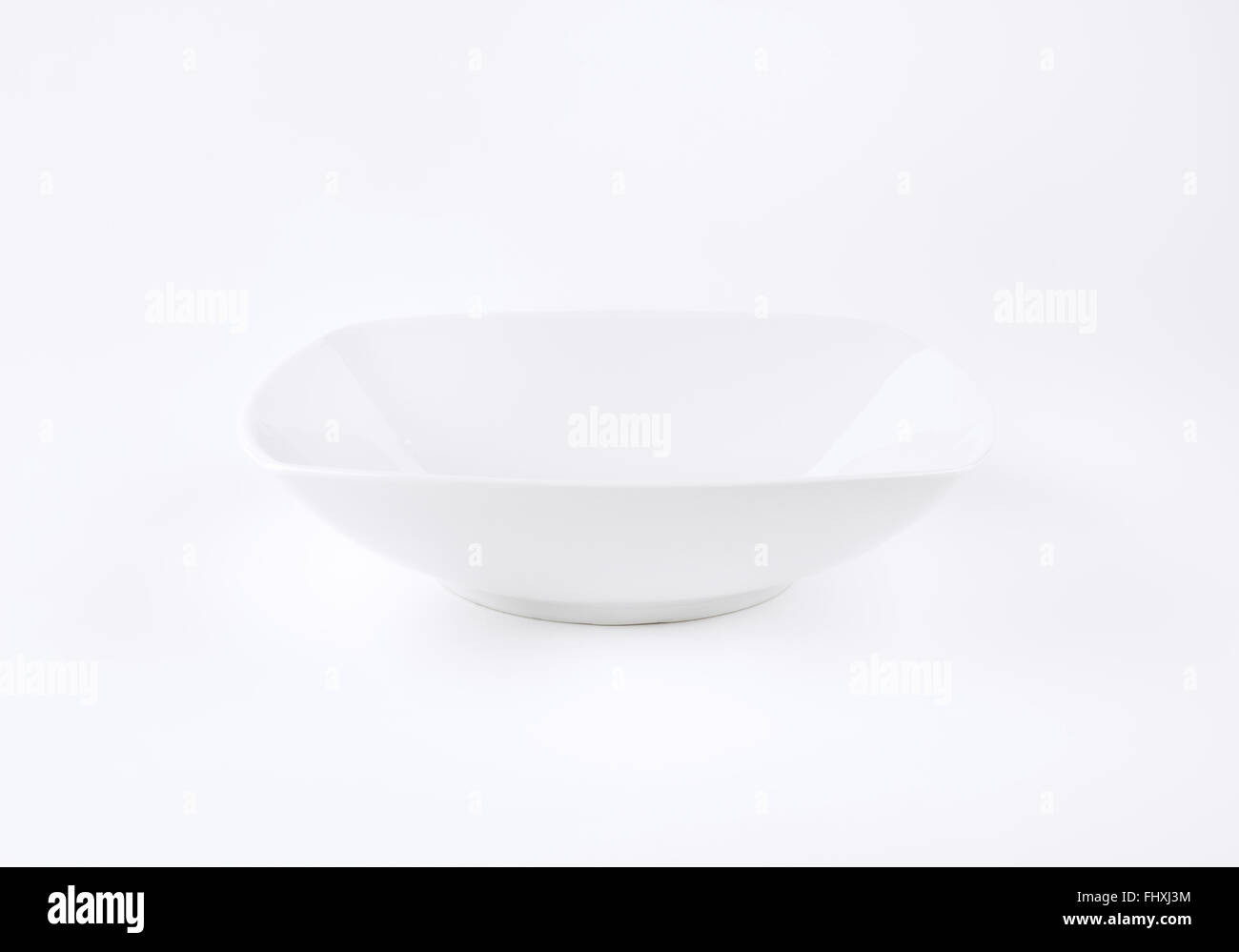 white square soup plate on white background Stock Photo - Alamy