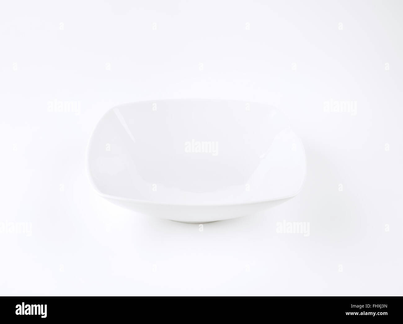 white square soup plate on white background Stock Photo - Alamy