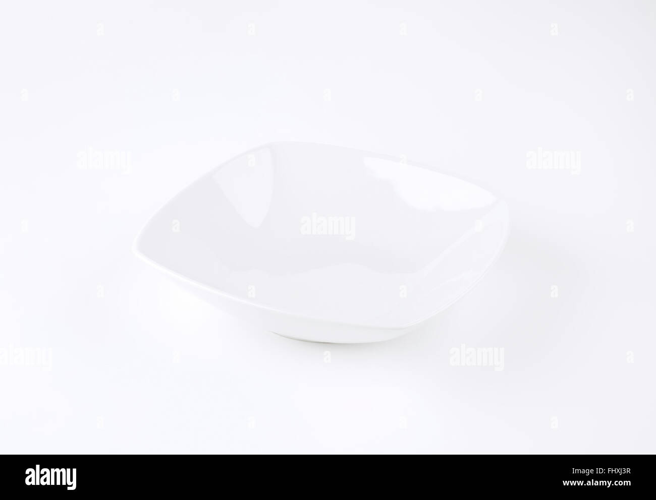white square soup plate on white background Stock Photo - Alamy