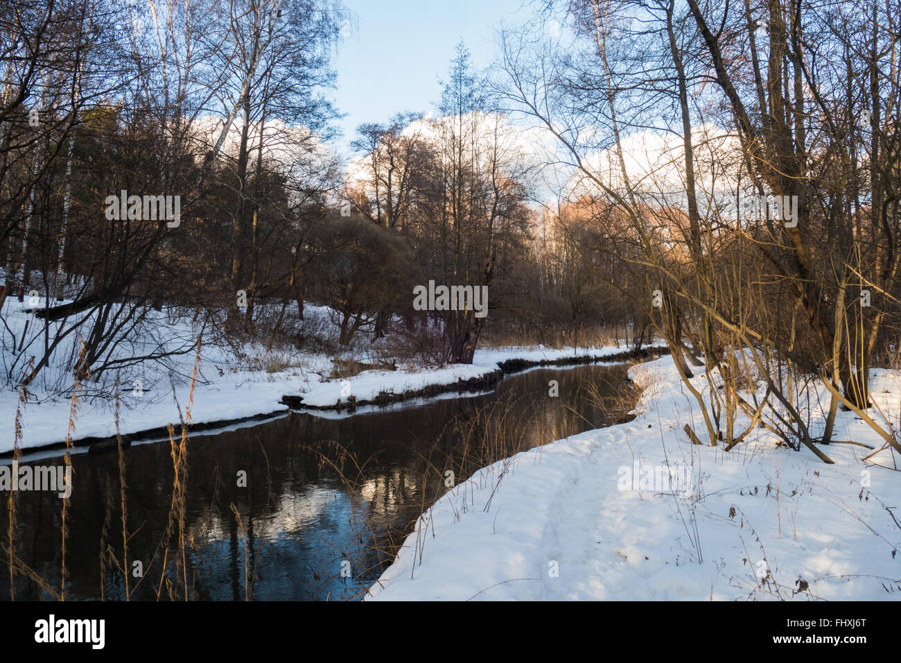 winter river, the sun and snow Stock Photo - Alamy