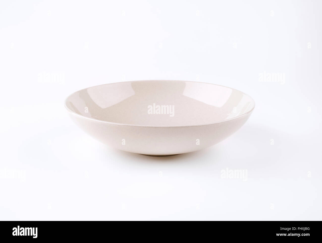 pink soup plate on white background Stock Photo - Alamy