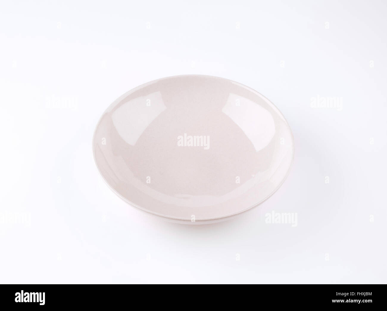 pink soup plate on white background Stock Photo - Alamy