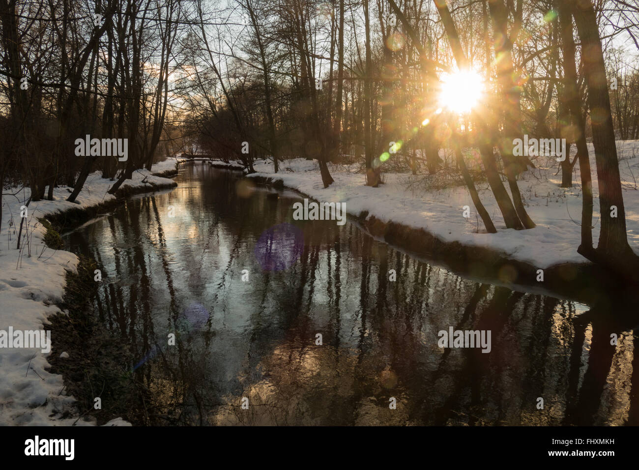 winter river, the sun and snow Stock Photo - Alamy