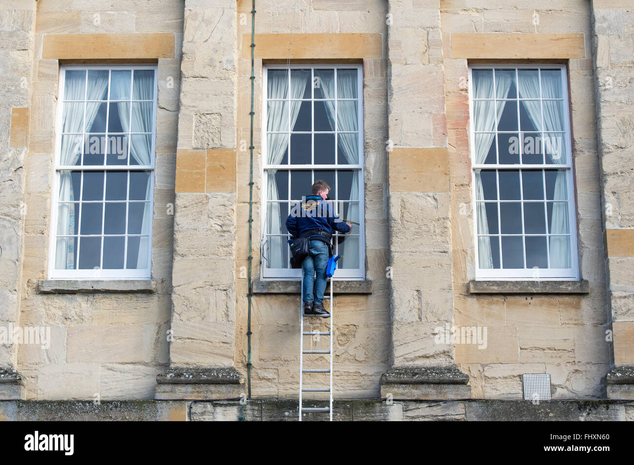 Man cleaning windows hi-res stock photography and images - Alamy
