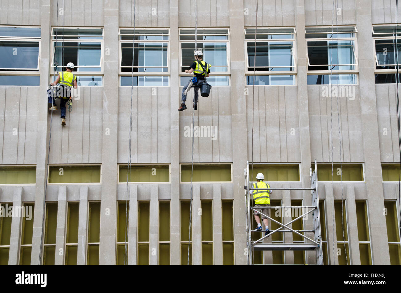 Building cleaners on the outside of the building London / England, UK ...