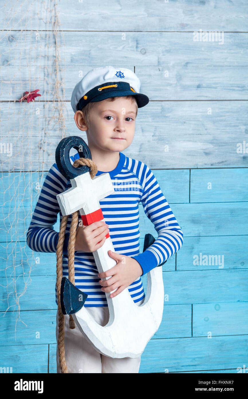 little boy holding anchor Stock Photo - Alamy