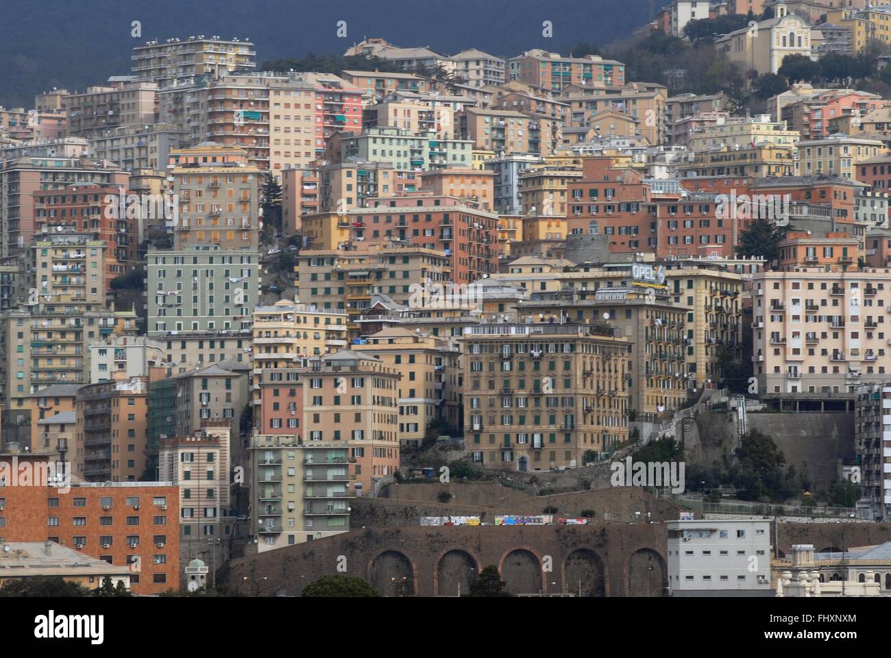 Italy, houses of Genoa town seen from the harbor Stock Photo - Alamy