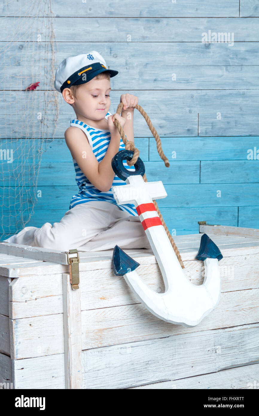 little boy holding anchor Stock Photo - Alamy