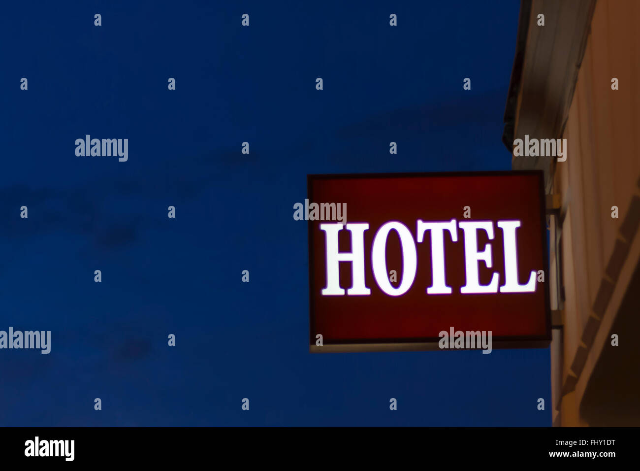 Hotel sign against a blue hour sky Stock Photo - Alamy