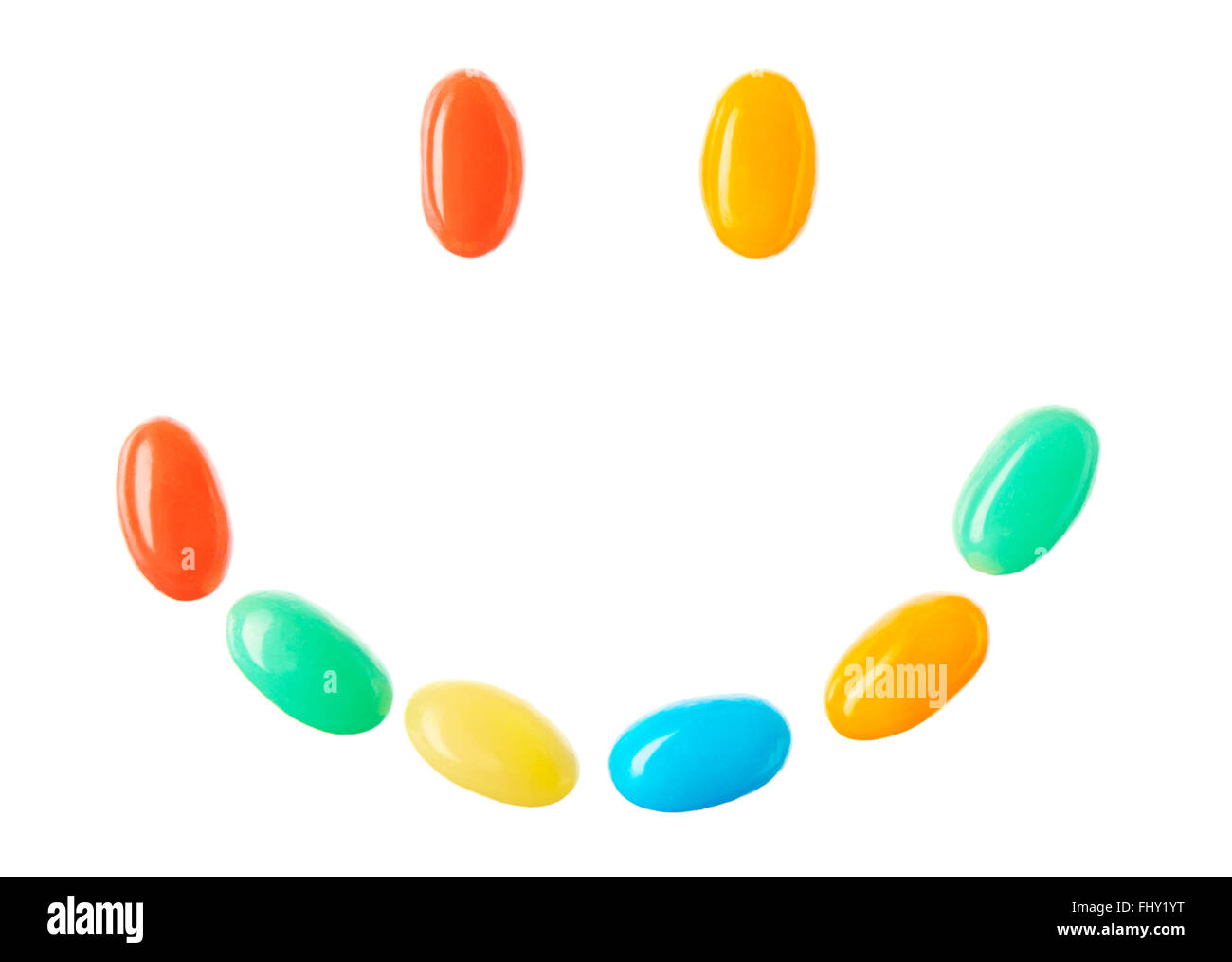 Happy smiling smiley made of multicolored candies isolated on white ...
