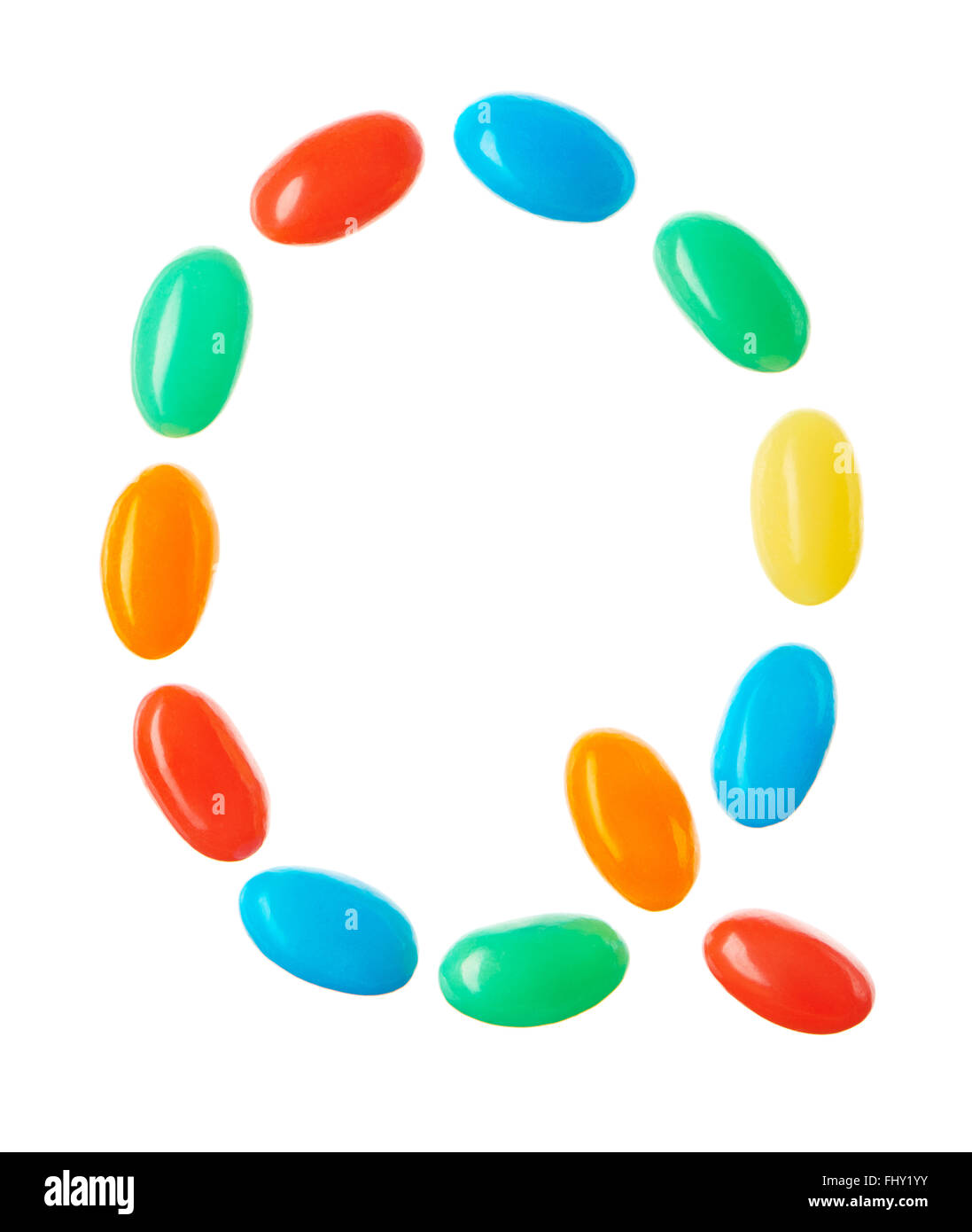 Q letter made of multicolored candies isolated on white background ...