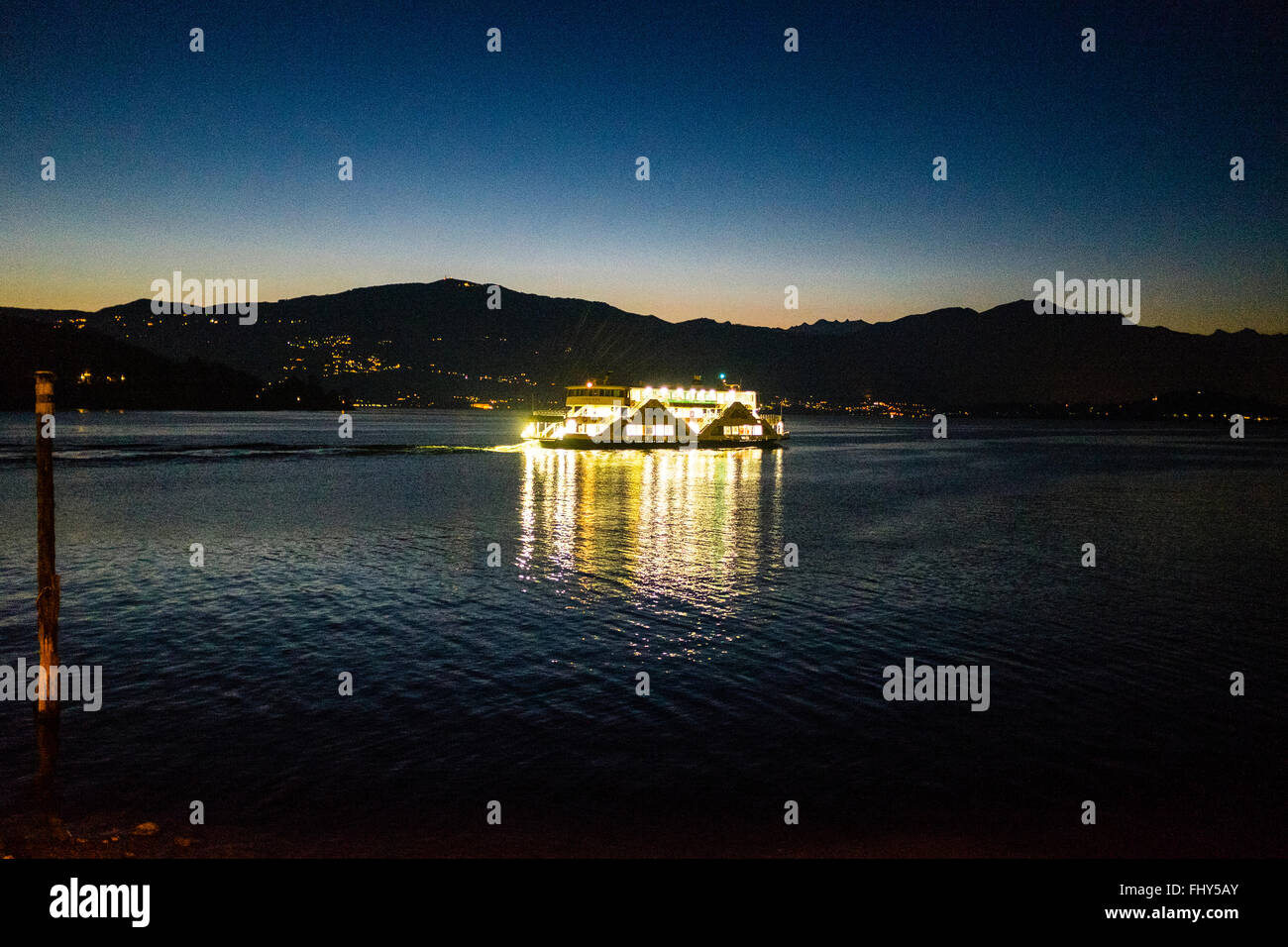 Lake Maggiore on the night,Boats and lights Stock Photo - Alamy