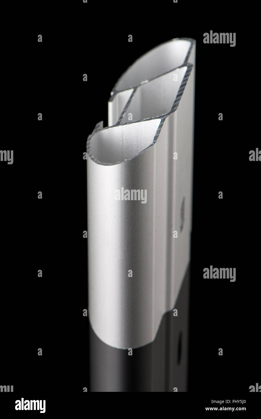 Aluminium profile sample isolated on black background Stock Photo - Alamy