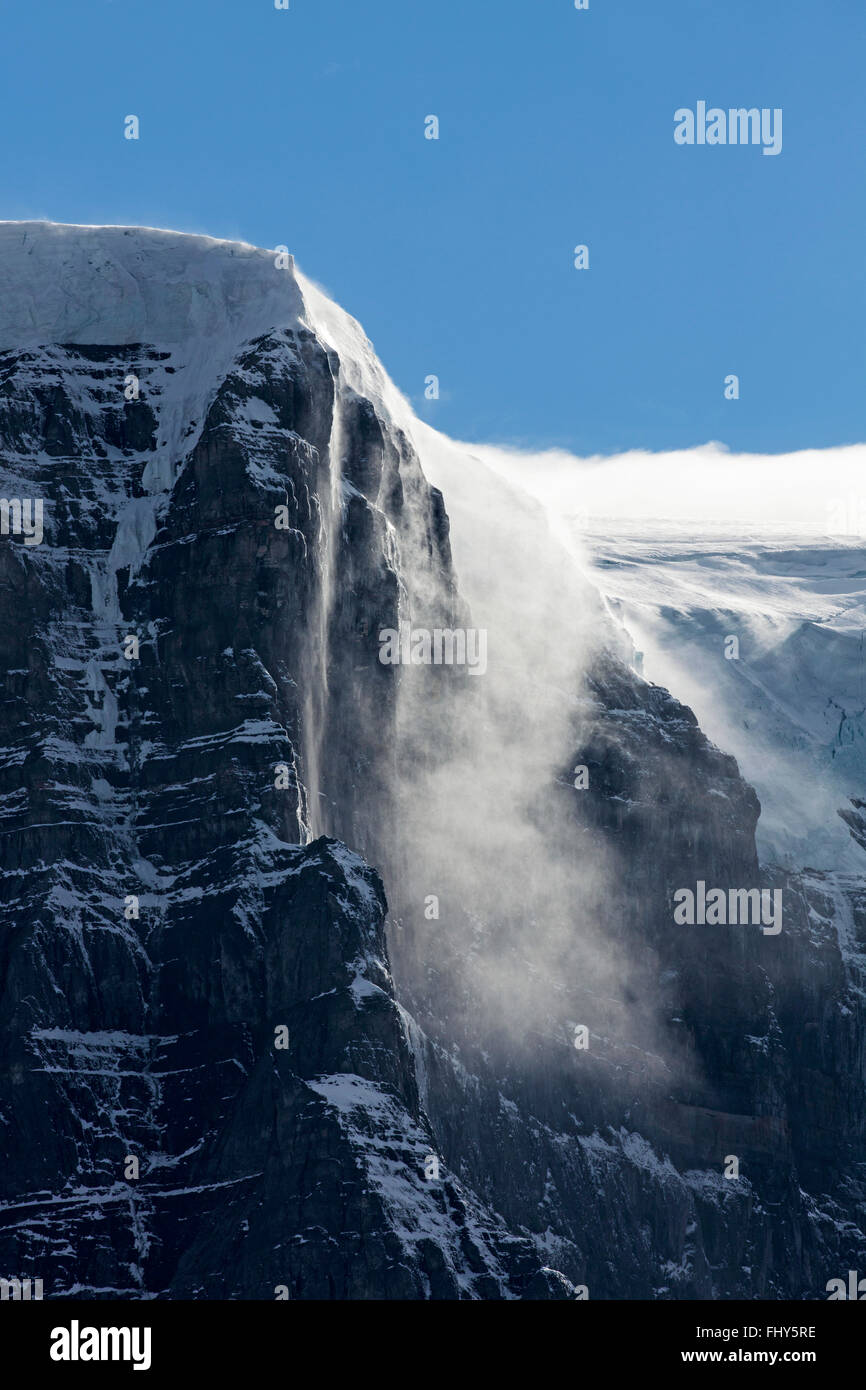 Snow blowing over cornices at Mount Kitchener, Jasper National Park ...
